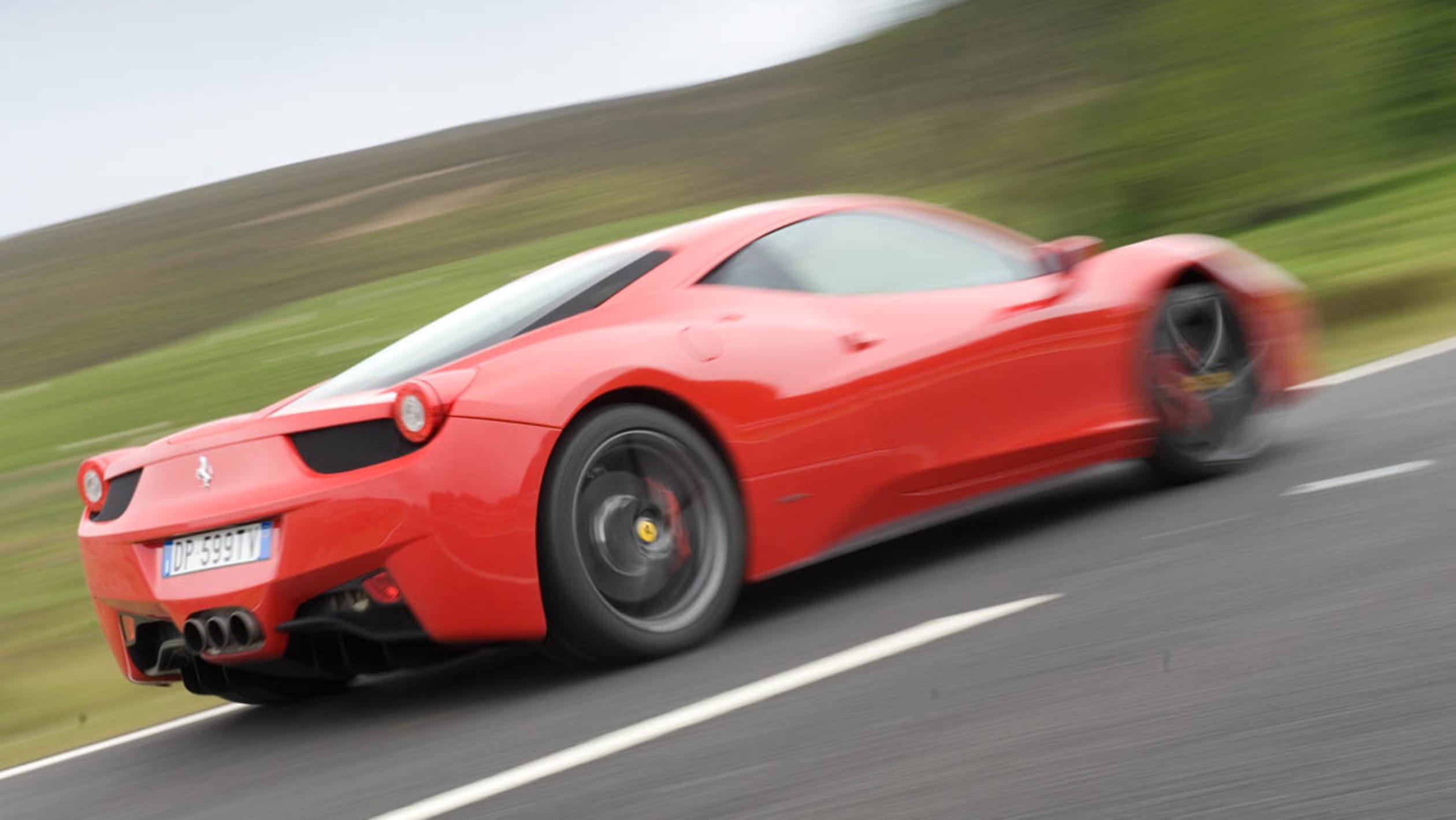 Ferrari 458 beats McLaren MP4-12C - Pictures | evo