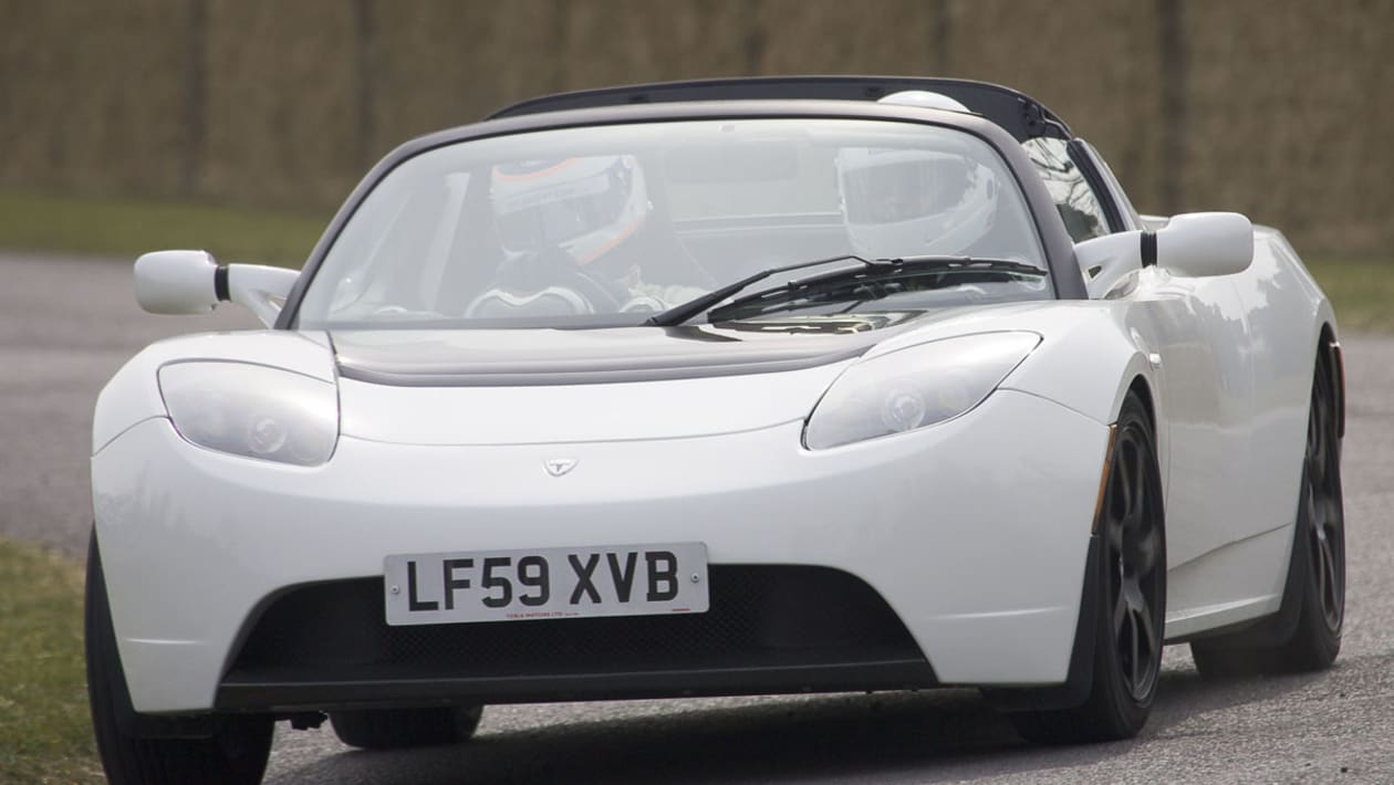 Tesla Roadster up Goodwood Hill | evo