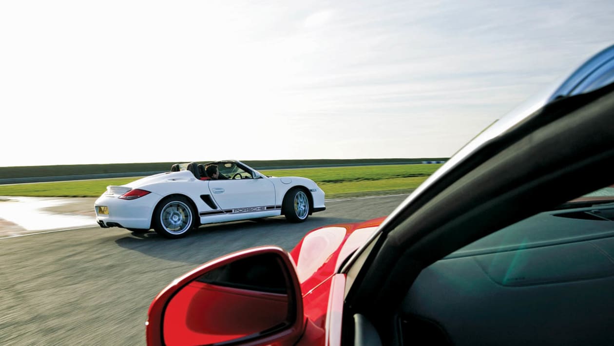 Video: Audi R8 Spyder V8 v Porsche Boxster Spyder | evo