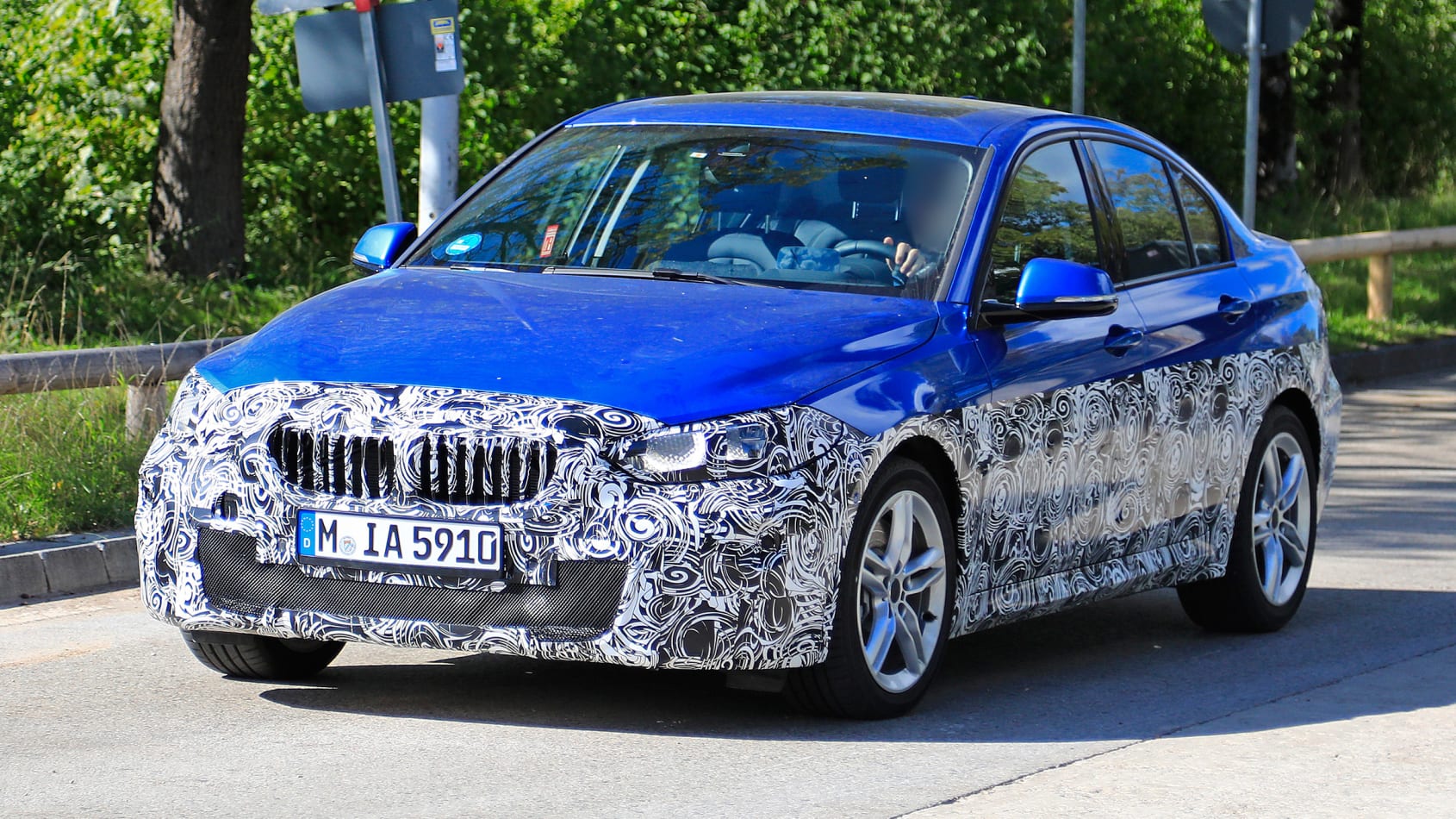 BMW 1-series saloon spied - pictures | Evo