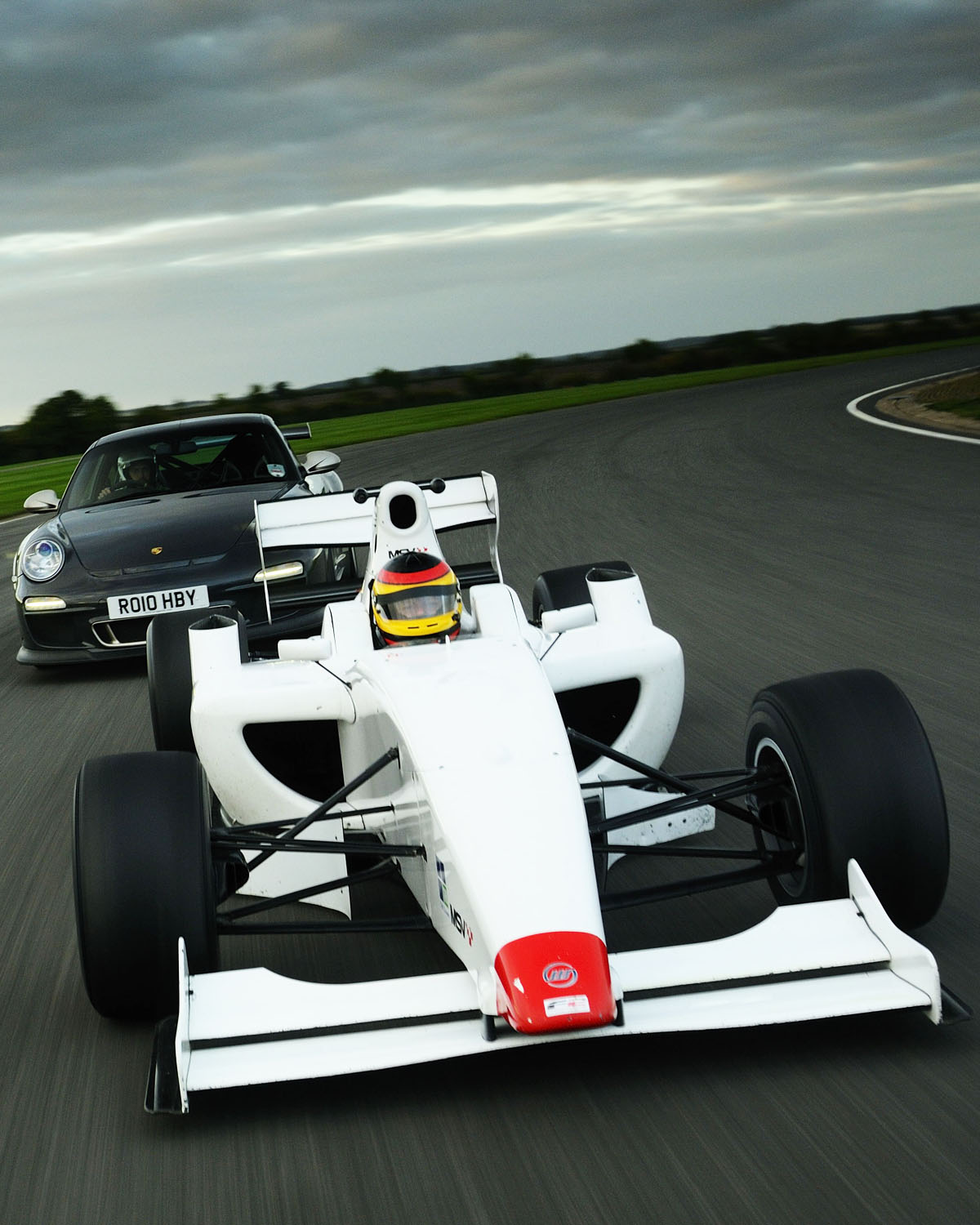 Formula 2 racing car v Porsche GT3 RS | evo