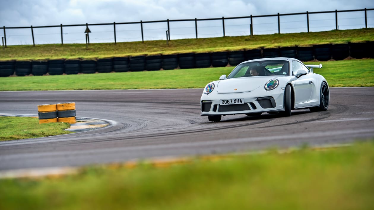 Porsche 911 GT3 vs GT3 RS vs GT2 RS - track battle | evo